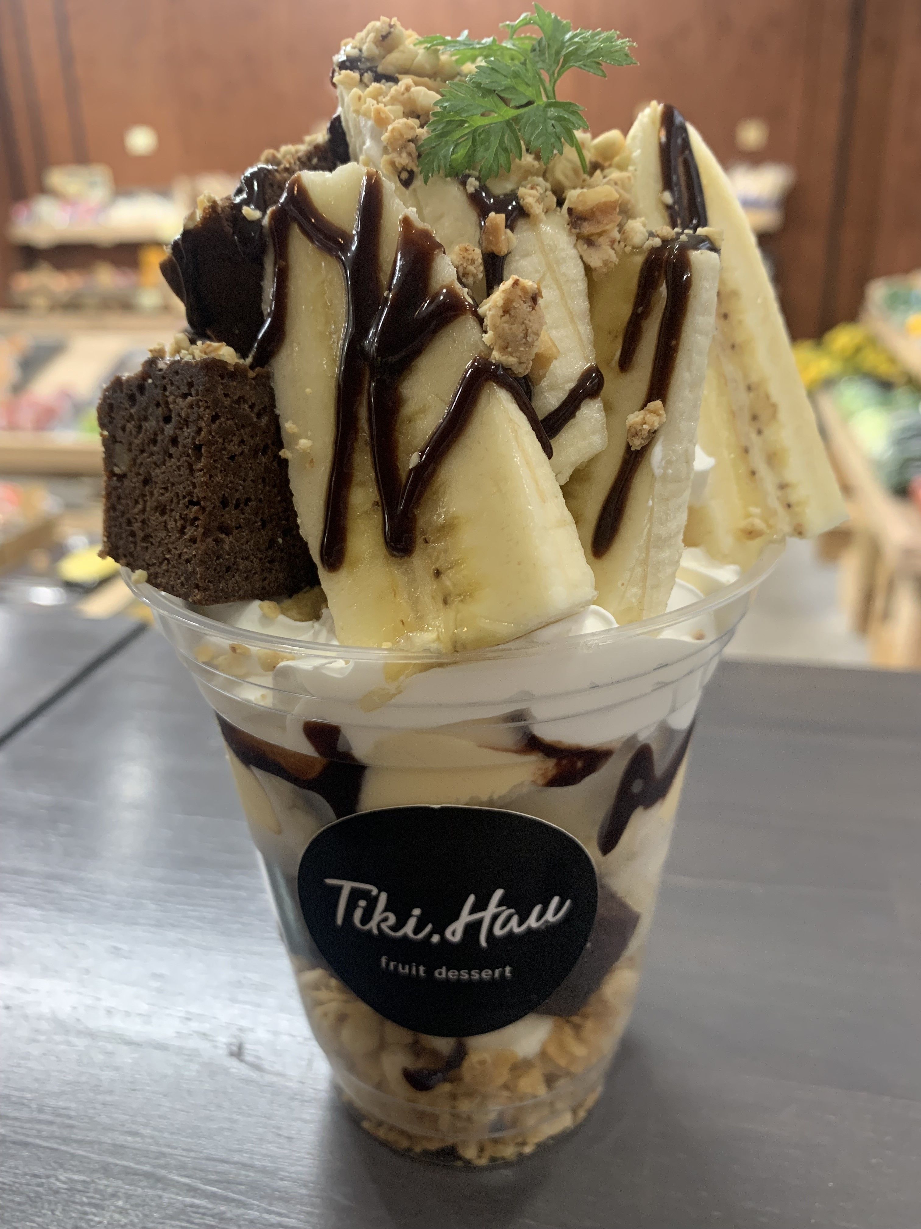 It's like a fruit tower! A parfait filled with fresh fruit that is made ...
